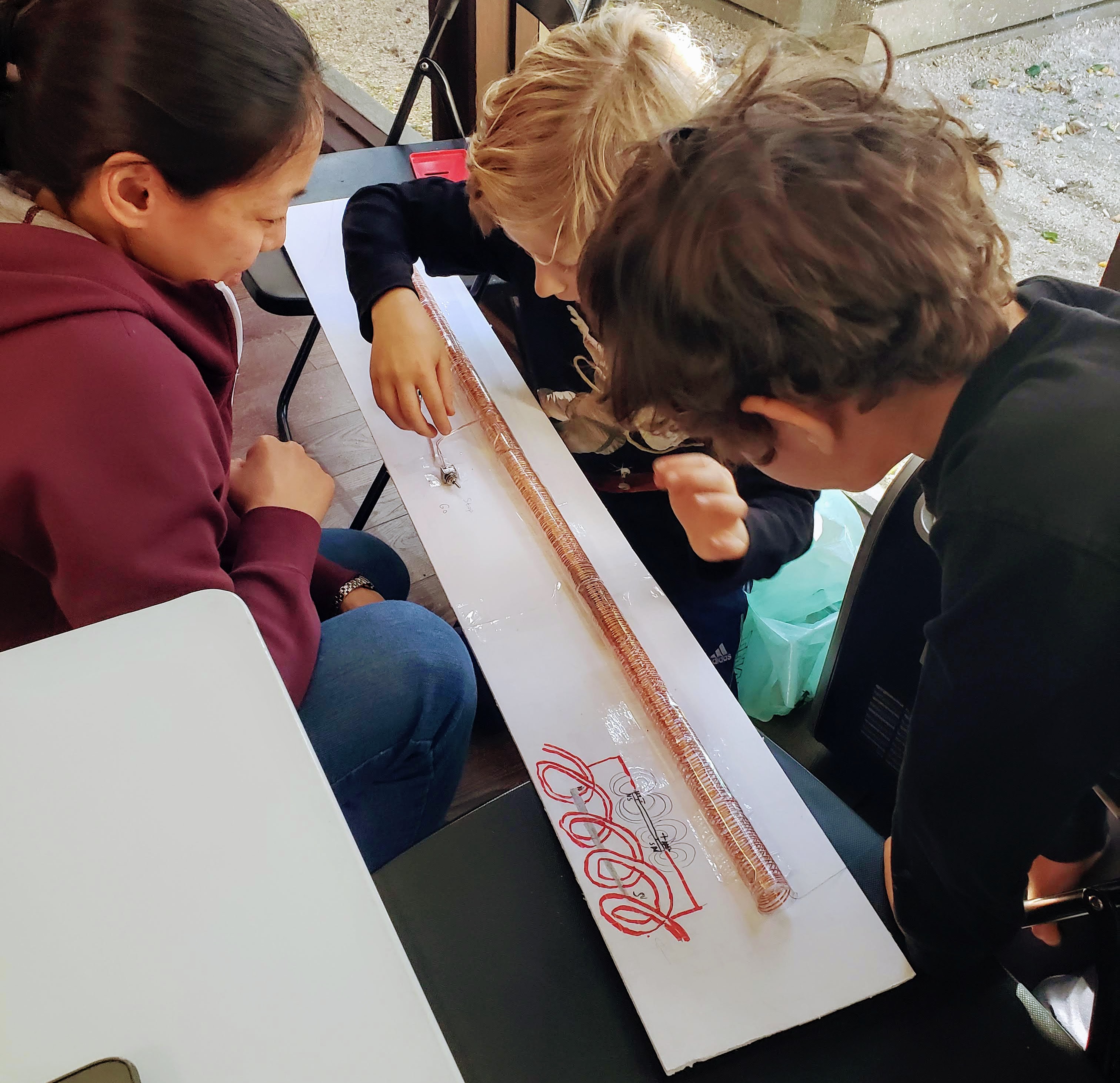 Maker Faire | Magnetic Train, With a Stop!