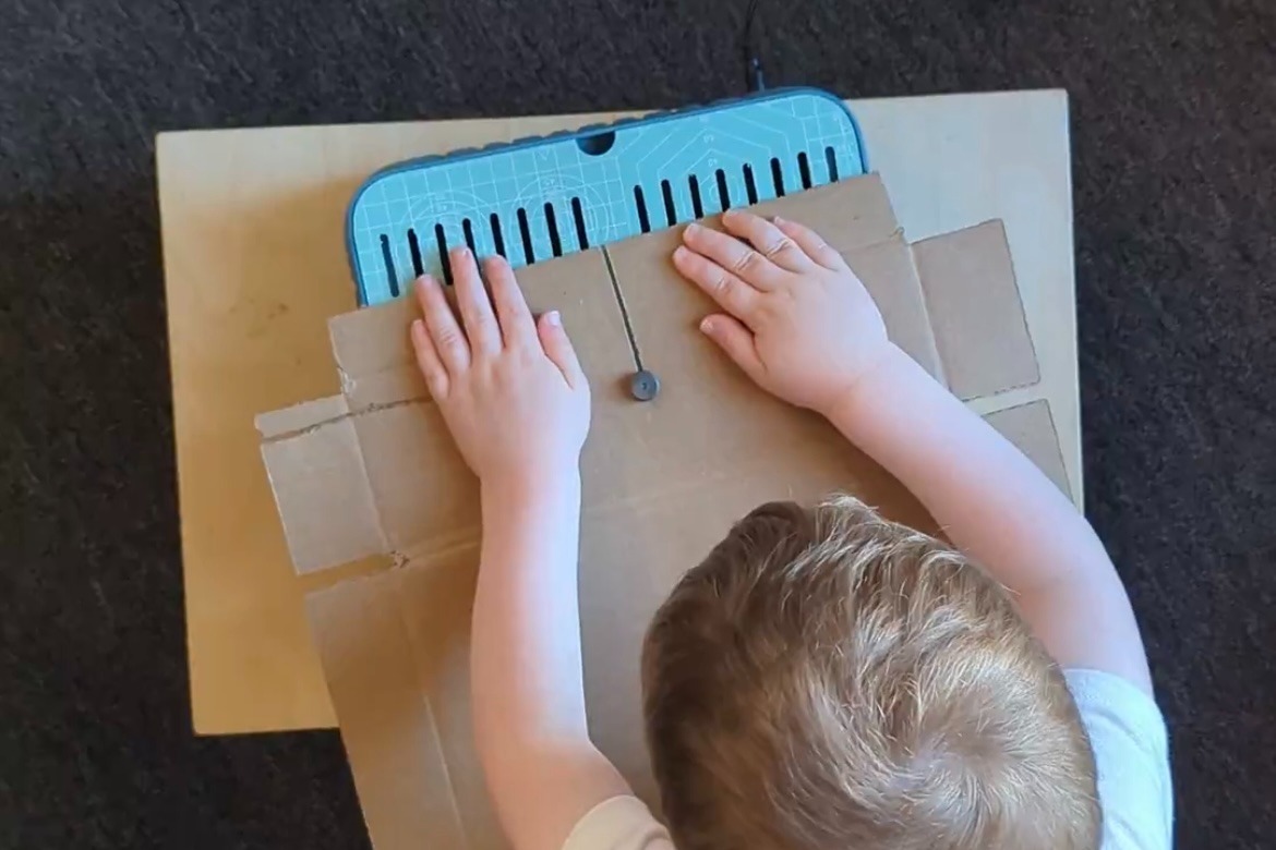 Maker Faire | InvenTABLE: A kid-safe power tool for cutting cardboard!